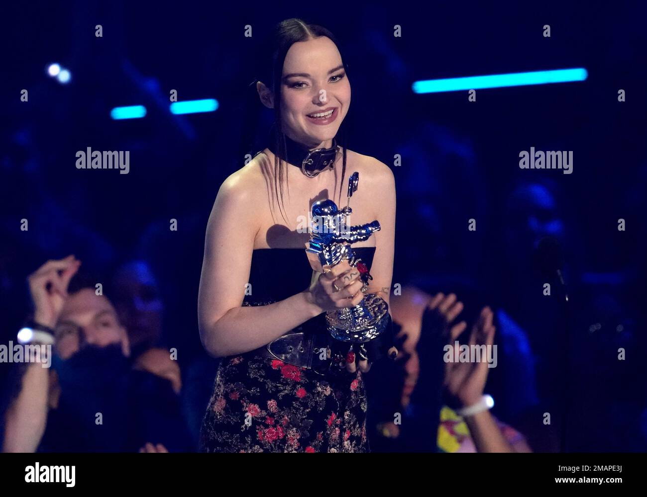Dove Cameron accepts the award for best new artist at the MTV Video ...