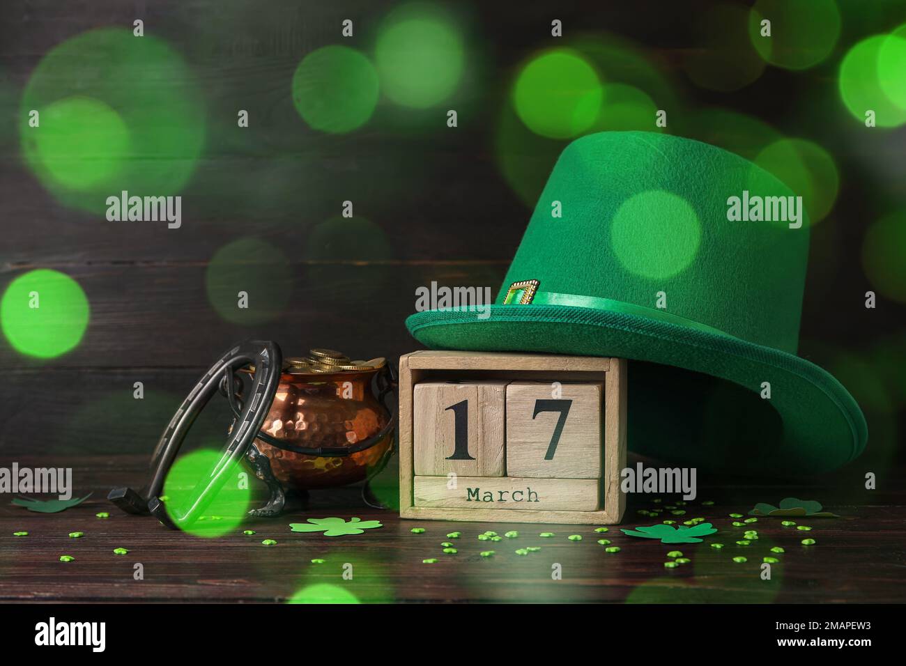 Leprechaun's hat, calendar with date of St. Patrick's Day, pot with ...