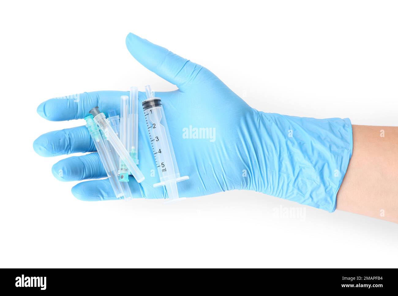 Female doctor with medical syringe and needles on white background ...
