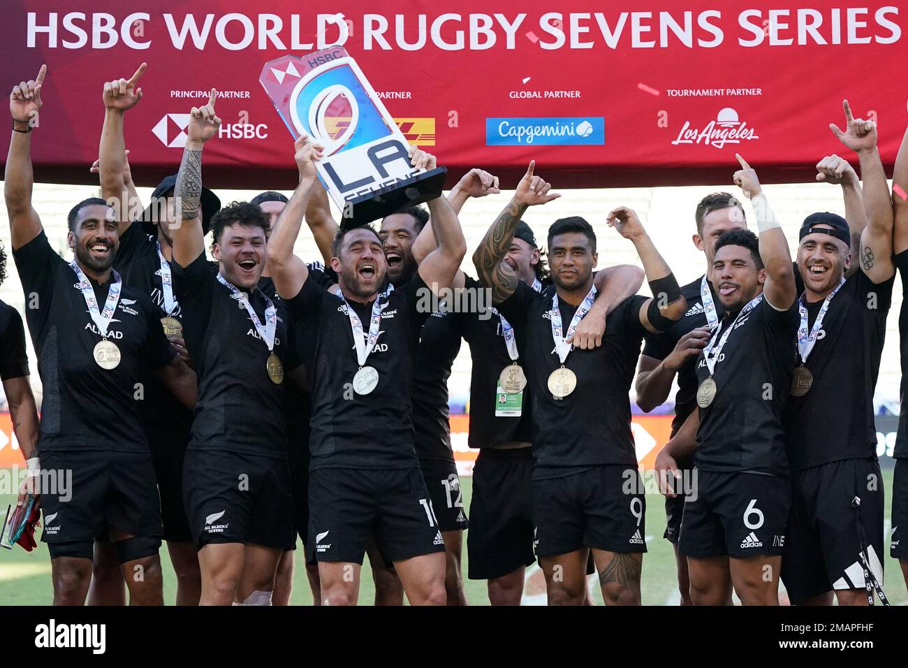 New Zealand's Kurt baker lifts the trophy for winning the Los Angeles ...