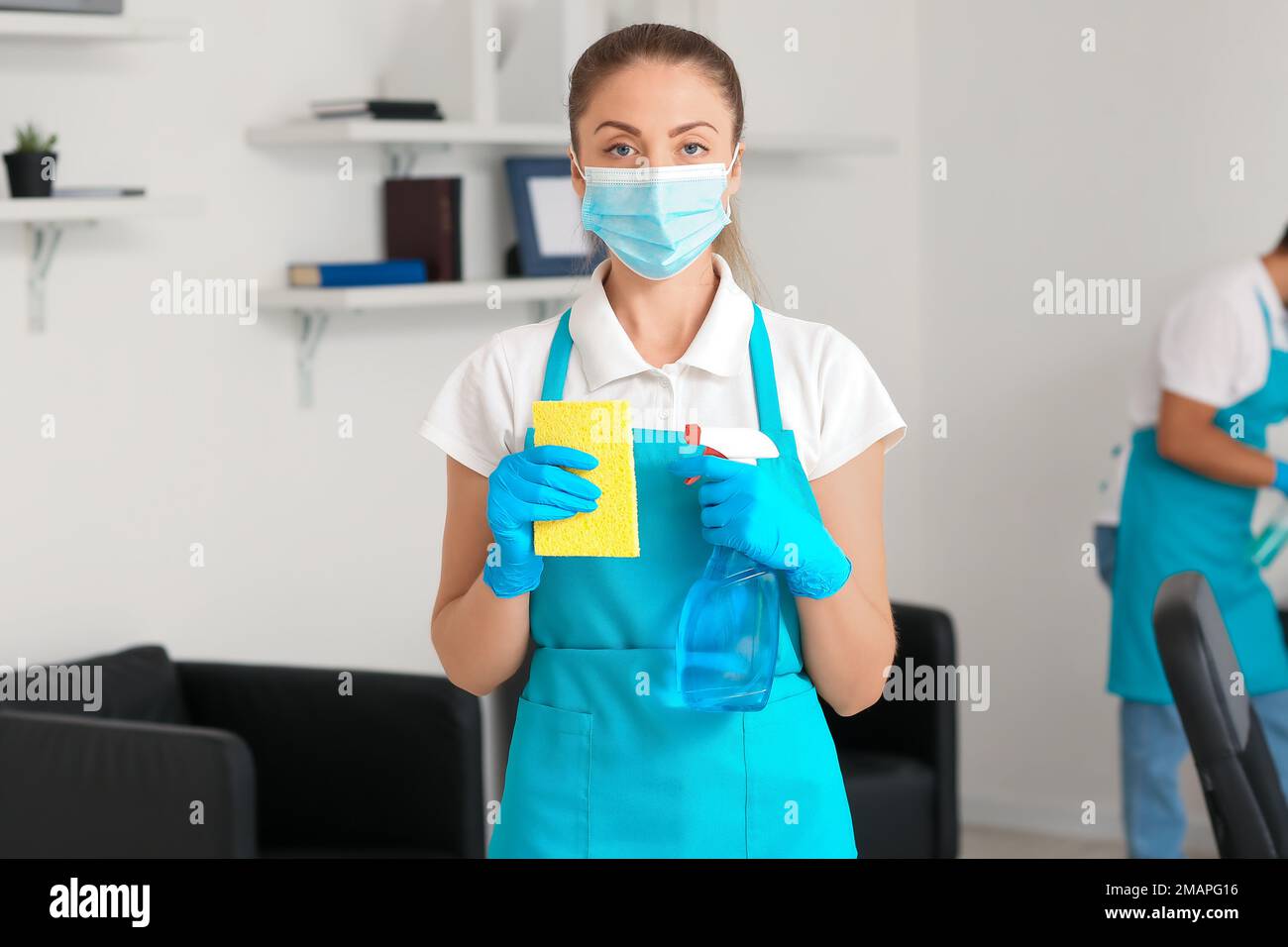 Female janitor medical mask hi-res stock photography and images - Alamy