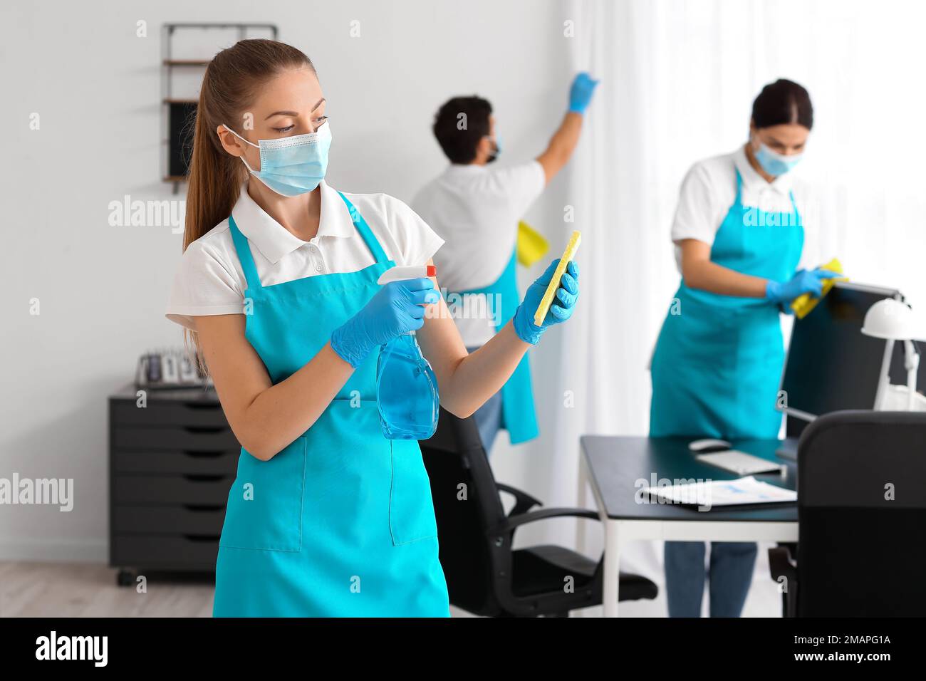 Female janitor medical mask hi-res stock photography and images - Alamy