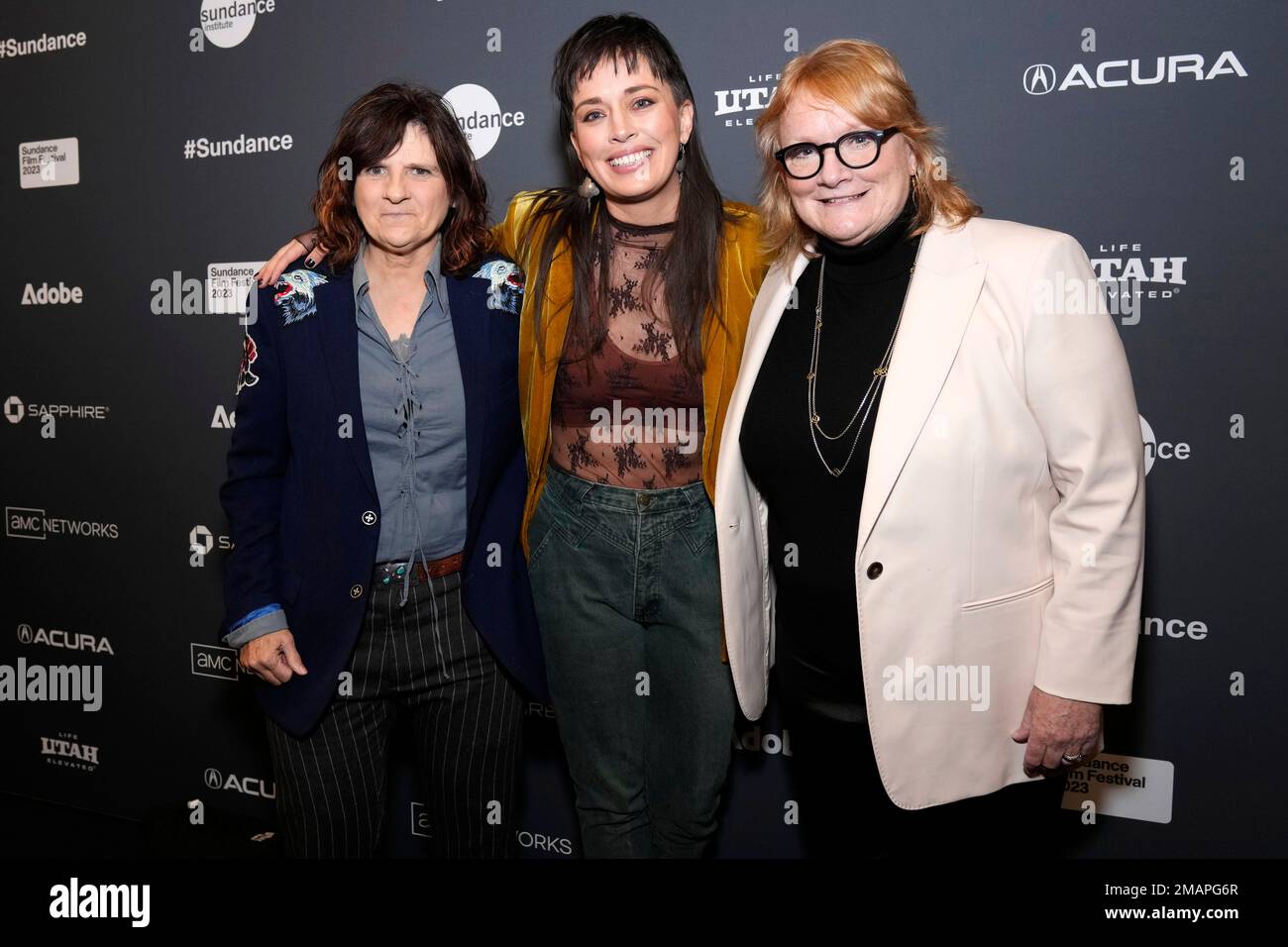 Amy Ray, left, Alexandria Bombach and Emily Saliers attend the premiere ...