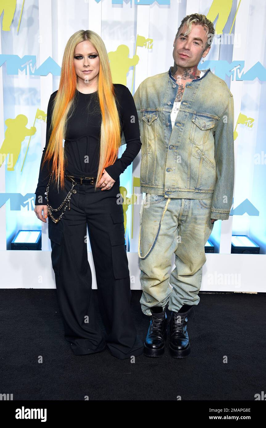 Avril Lavigne, left, and Mod Sun arrive at the MTV Video Music Awards ...