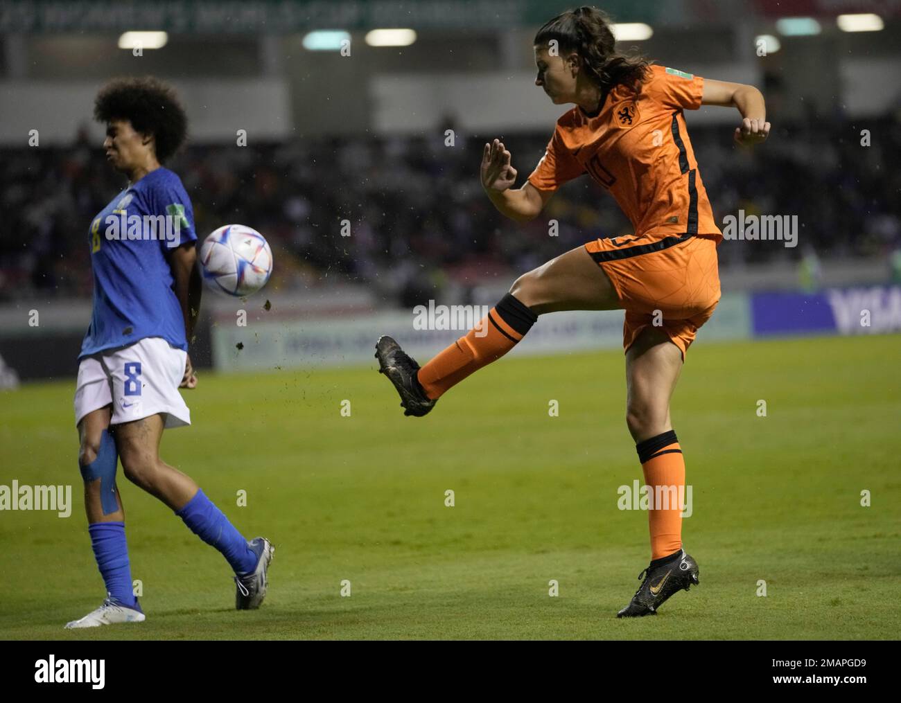 Netherlands' Danique Noordman, right, kicks the ball into Brazil's Yaya ...
