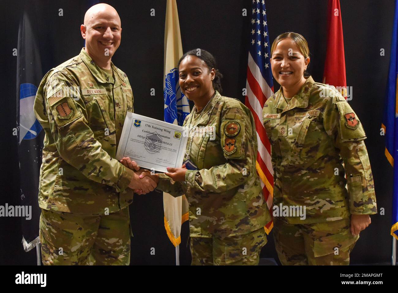 U.S. Air Force Col. Matthew Reilman, 17th Training Wing commander, and Chief Master Sgt. Rebecca ...