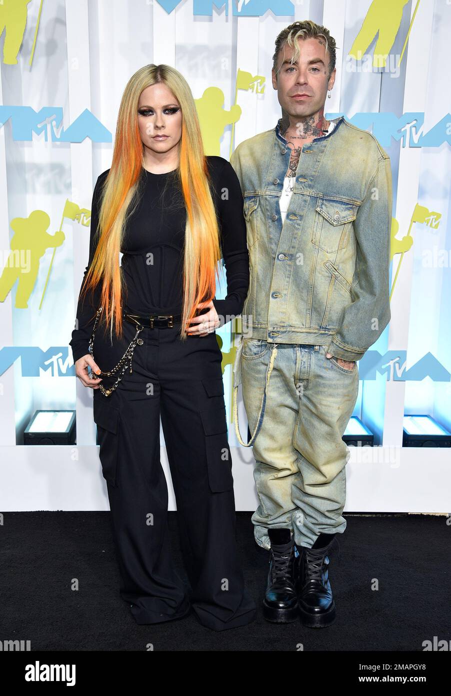 Avril Lavigne, left, and Mod Sun arrive at the MTV Video Music Awards ...
