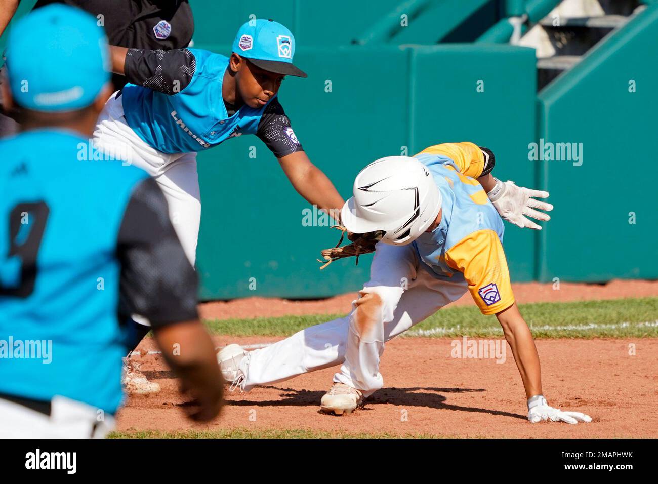 Curacao third baseman Shemar Jacobus tags out Honolulu's Kama Angell ...