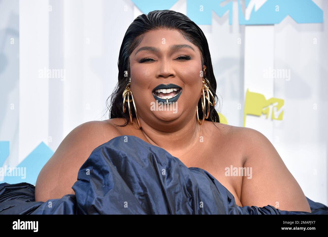 Lizzo arrives at the MTV Video Music Awards at the Prudential Center on ...