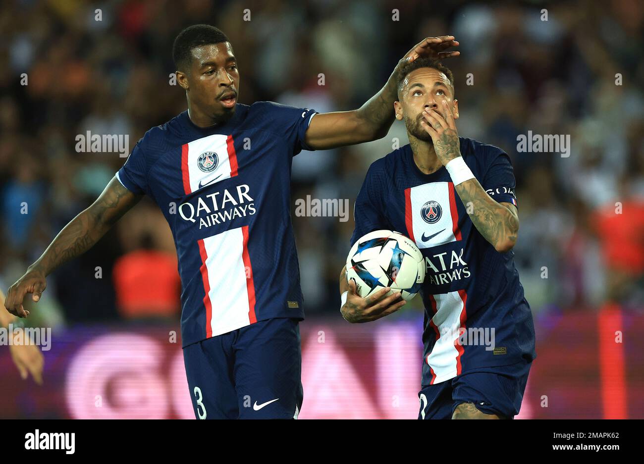 PSG's Presnel Kimpembe, left, and PSG's Neymar celebrate after scoring ...
