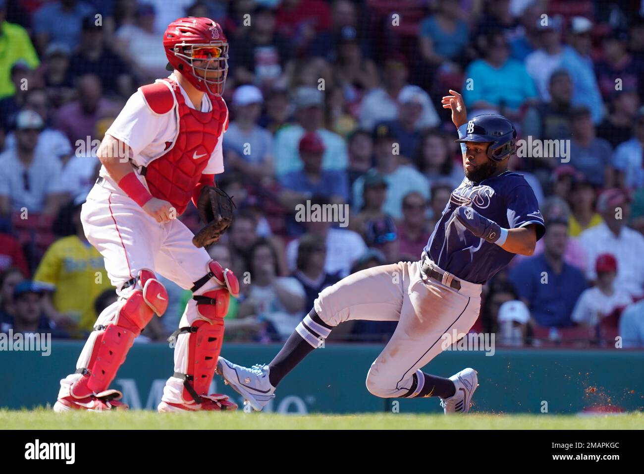 Tampa Bay Rays' Manuel Margot, right, scores on a double hit by Rays ...