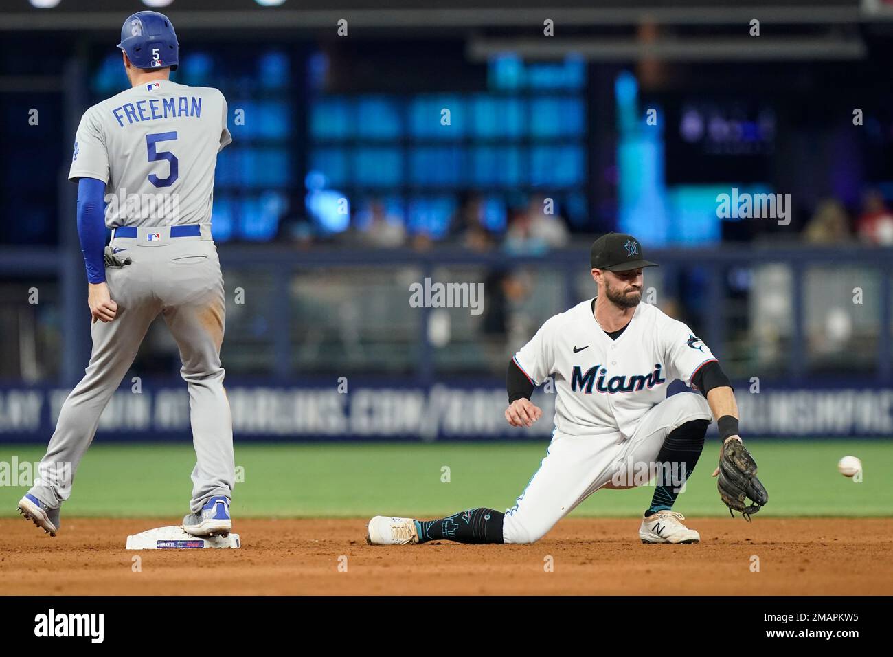 Los Angeles Dodgers' Freddie Freeman (5) is safe on second base as ...