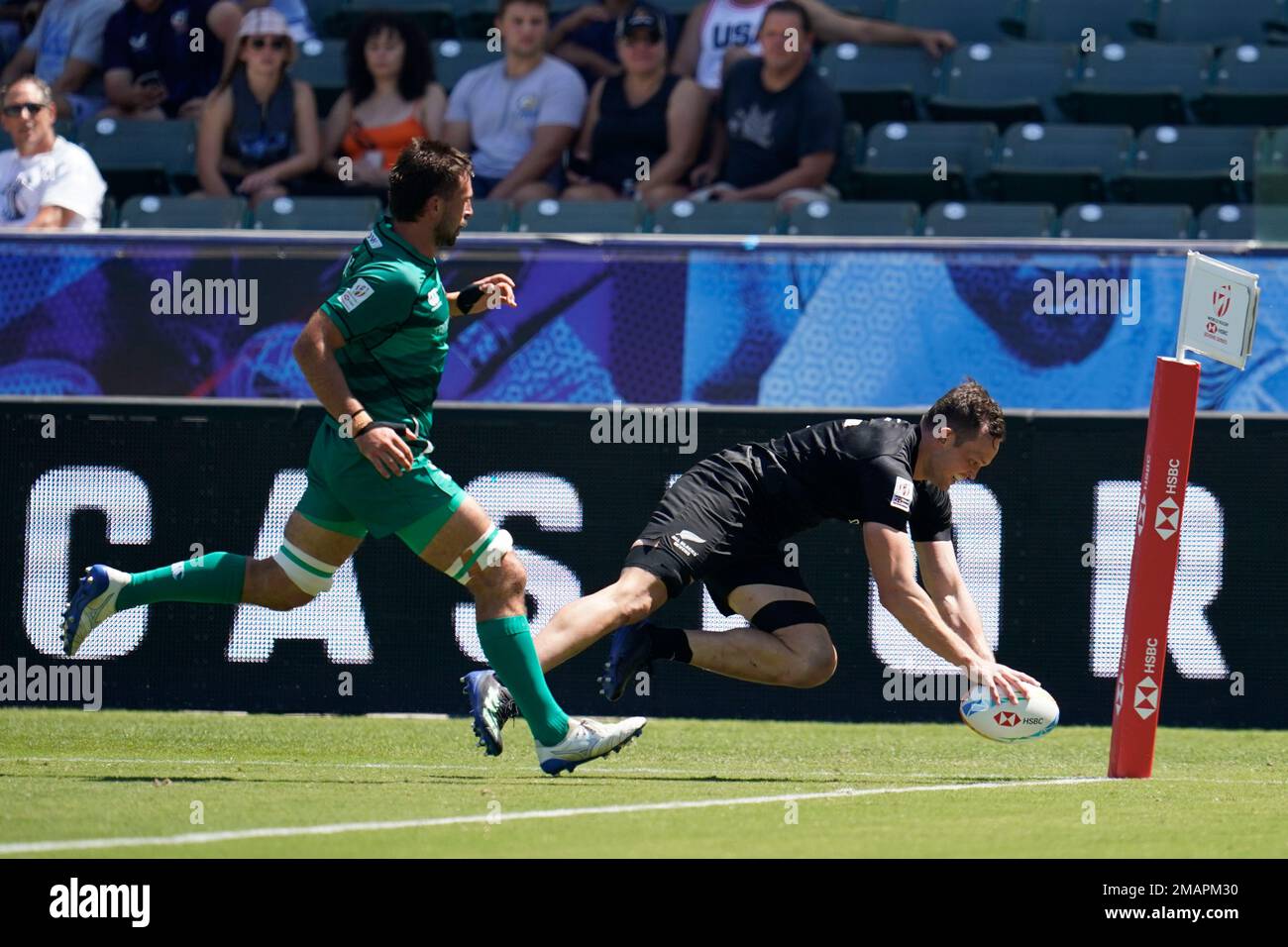 New Zealand's Lewis Ormond goes over the line to score a try against ...