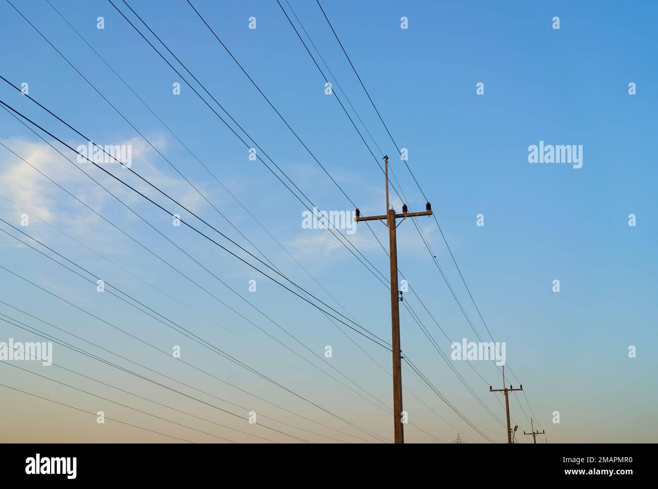 The electrical power lines with poles Stock Photo - Alamy