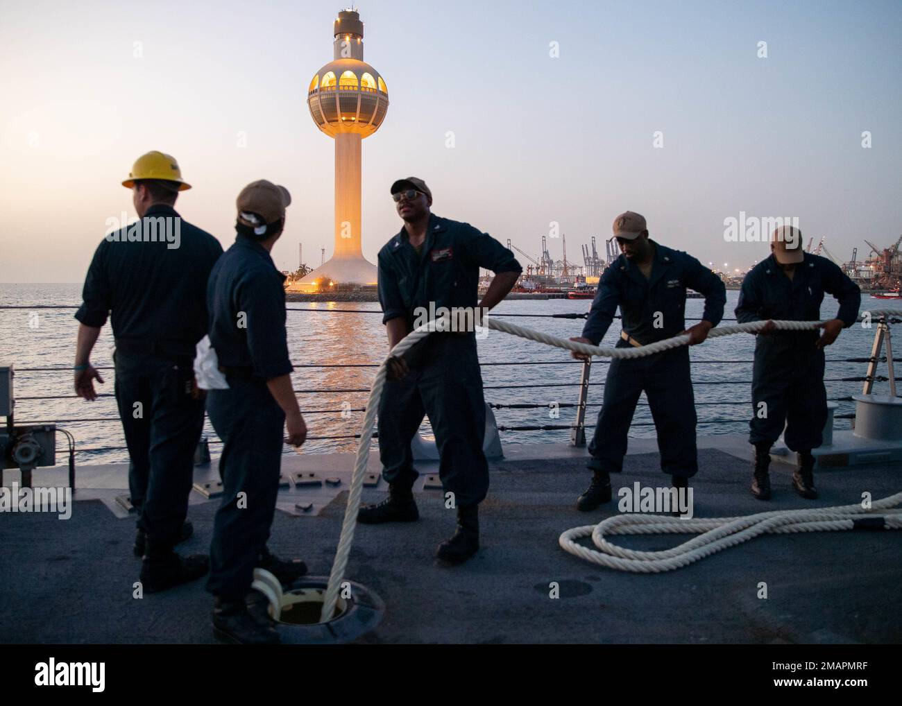 JEDDAH, Saudi Arabia (June 2, 2022) Sailors stow mooring lines aboard ...