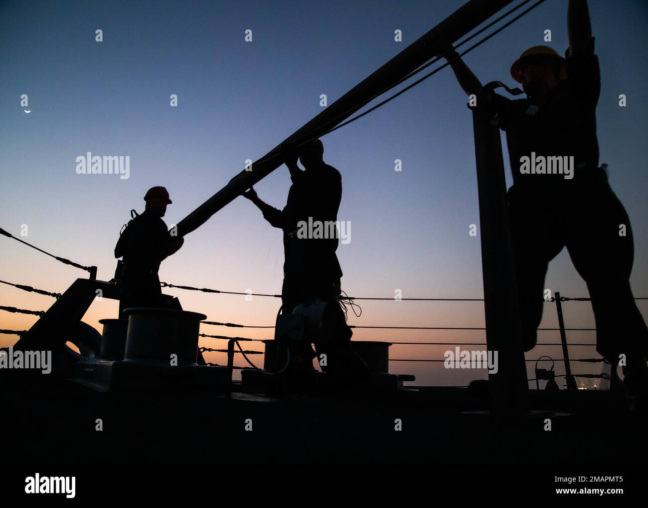 JEDDAH, Saudi Arabia (June 2, 2022) Sailors stow the jack staff aboard ...