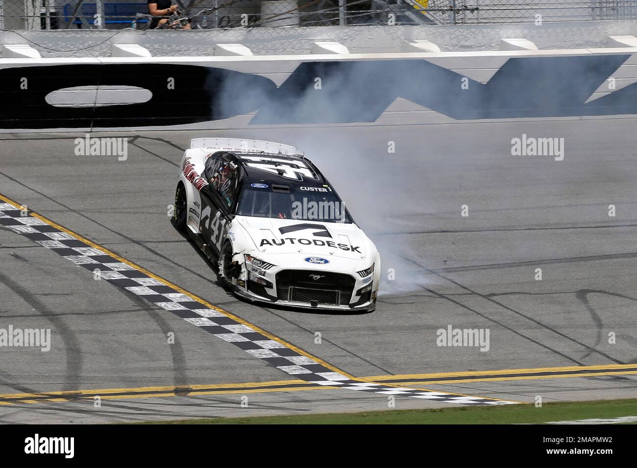 Cole Custer (41) slides along the front stretch after a multi-car ...