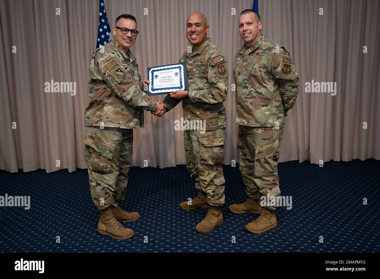 Lt. Col. Richard Baysinger, left, 66th Air Base Group deputy commander ...