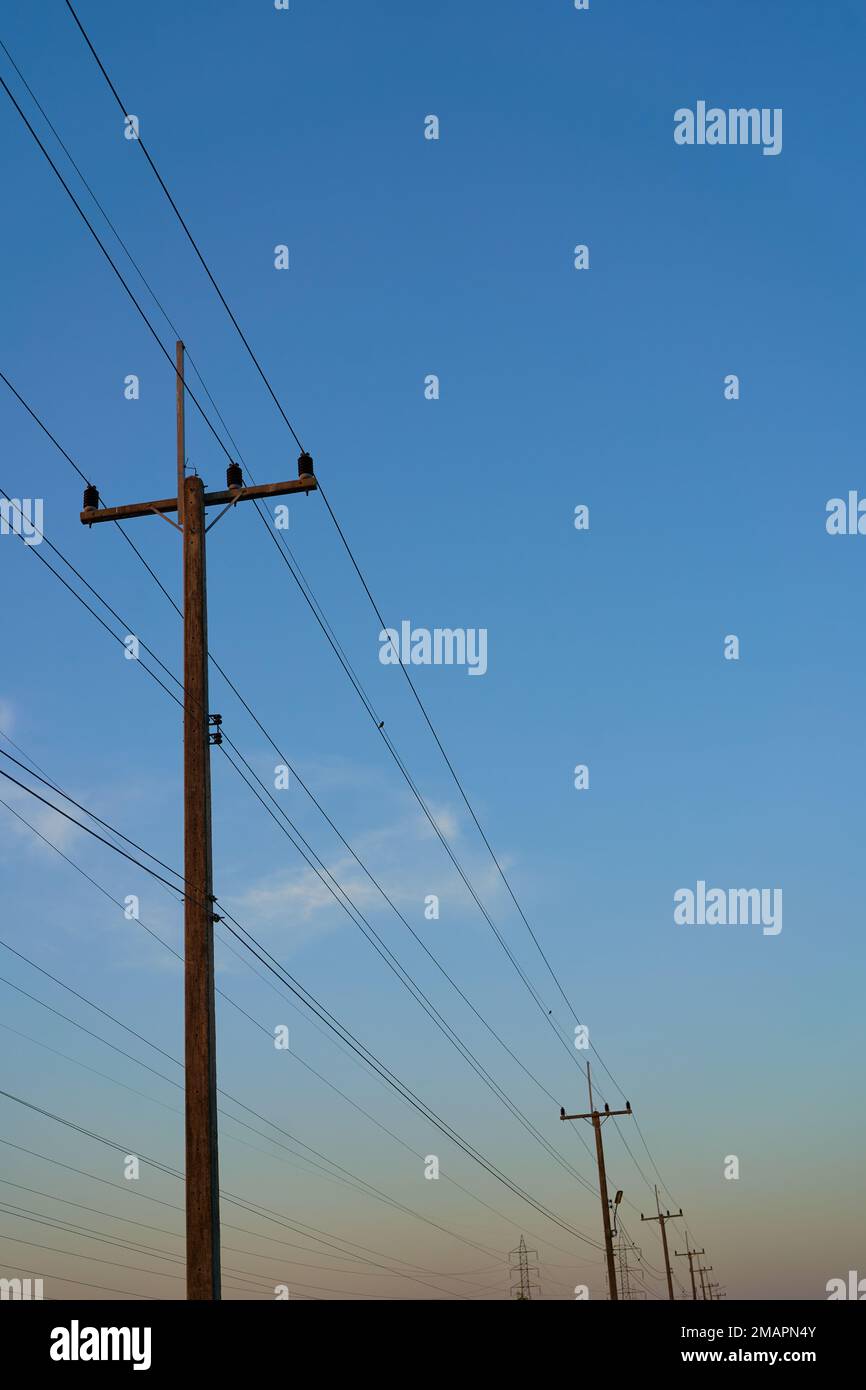 The electrical power lines with poles Stock Photo - Alamy