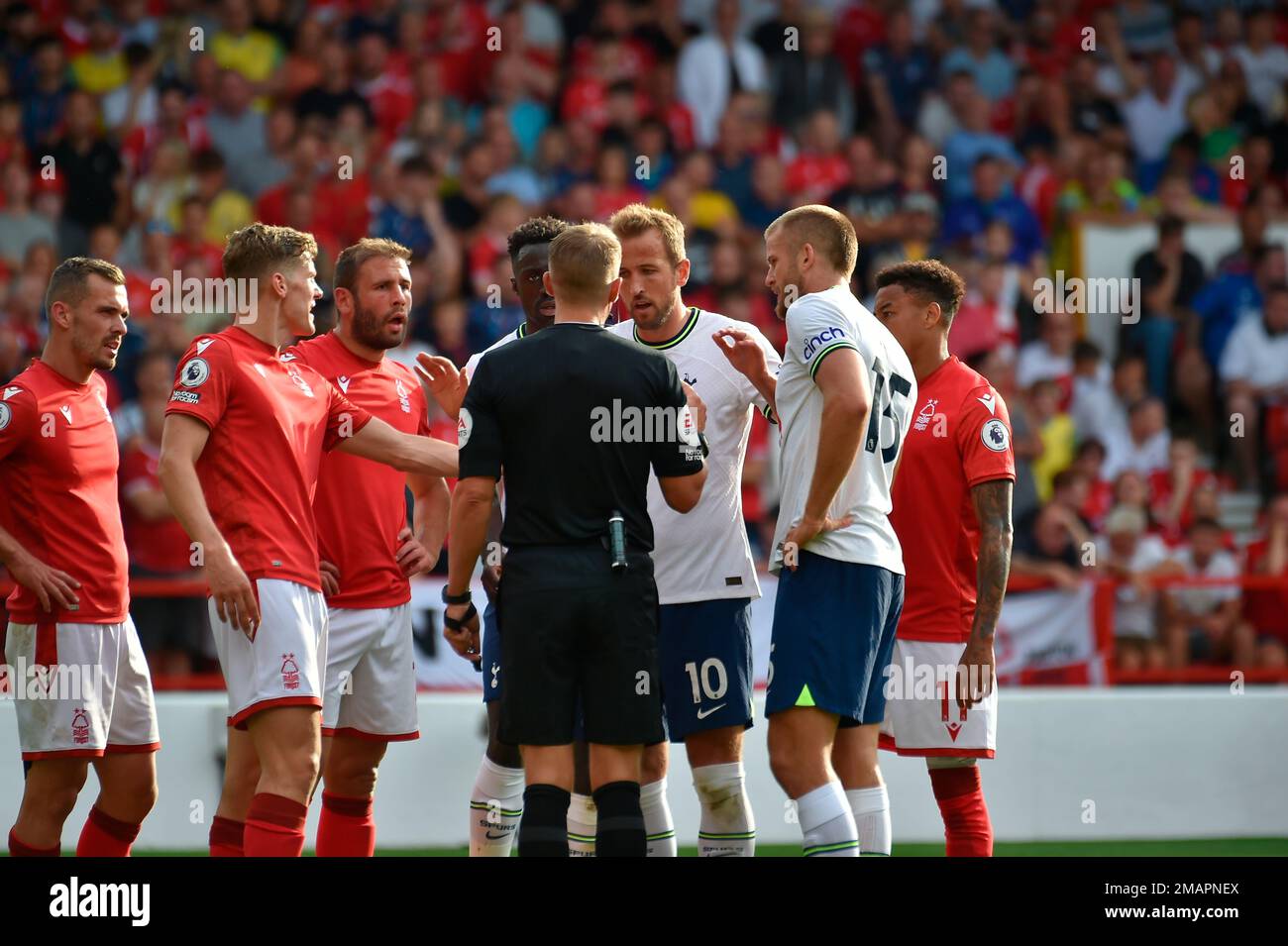 Players argue with the referee during the English Premier League soccer ...