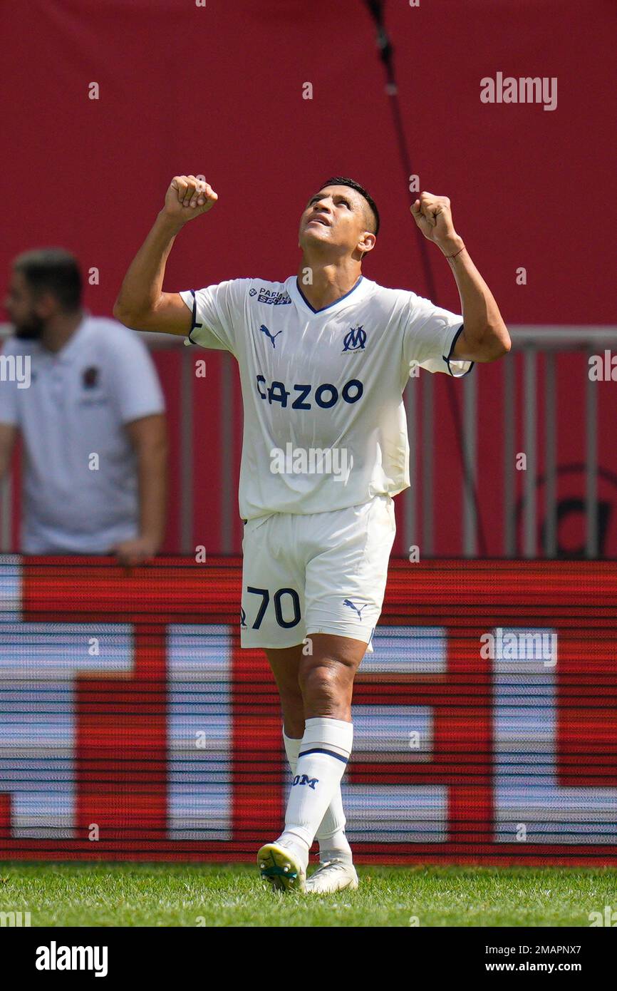 Marseille's Alexis Sanchez celebrates scoring his side's third goal ...