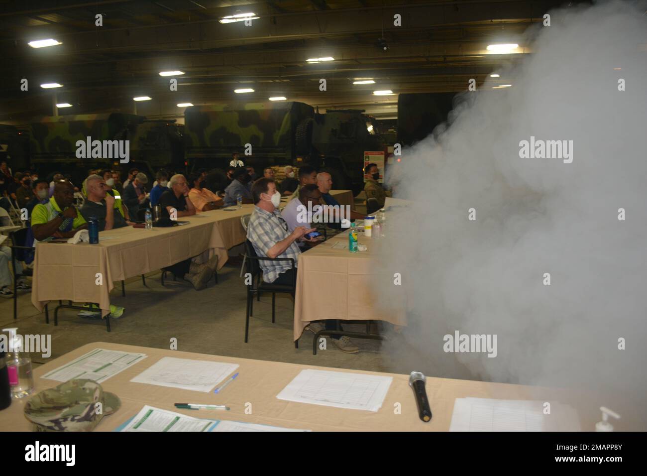 Simulated smoke billows into Warehouse 15 during the Army Field Support ...