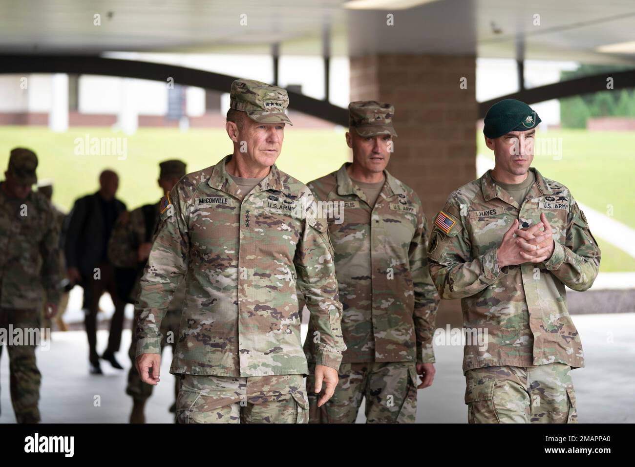 Chief of Staff of the Army Gen. James McConville left, walks with Brig ...
