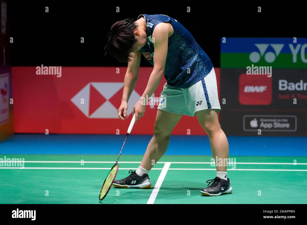 Japan's Akane Yamaguchi reacts after losing a point to China's Chen Yu ...