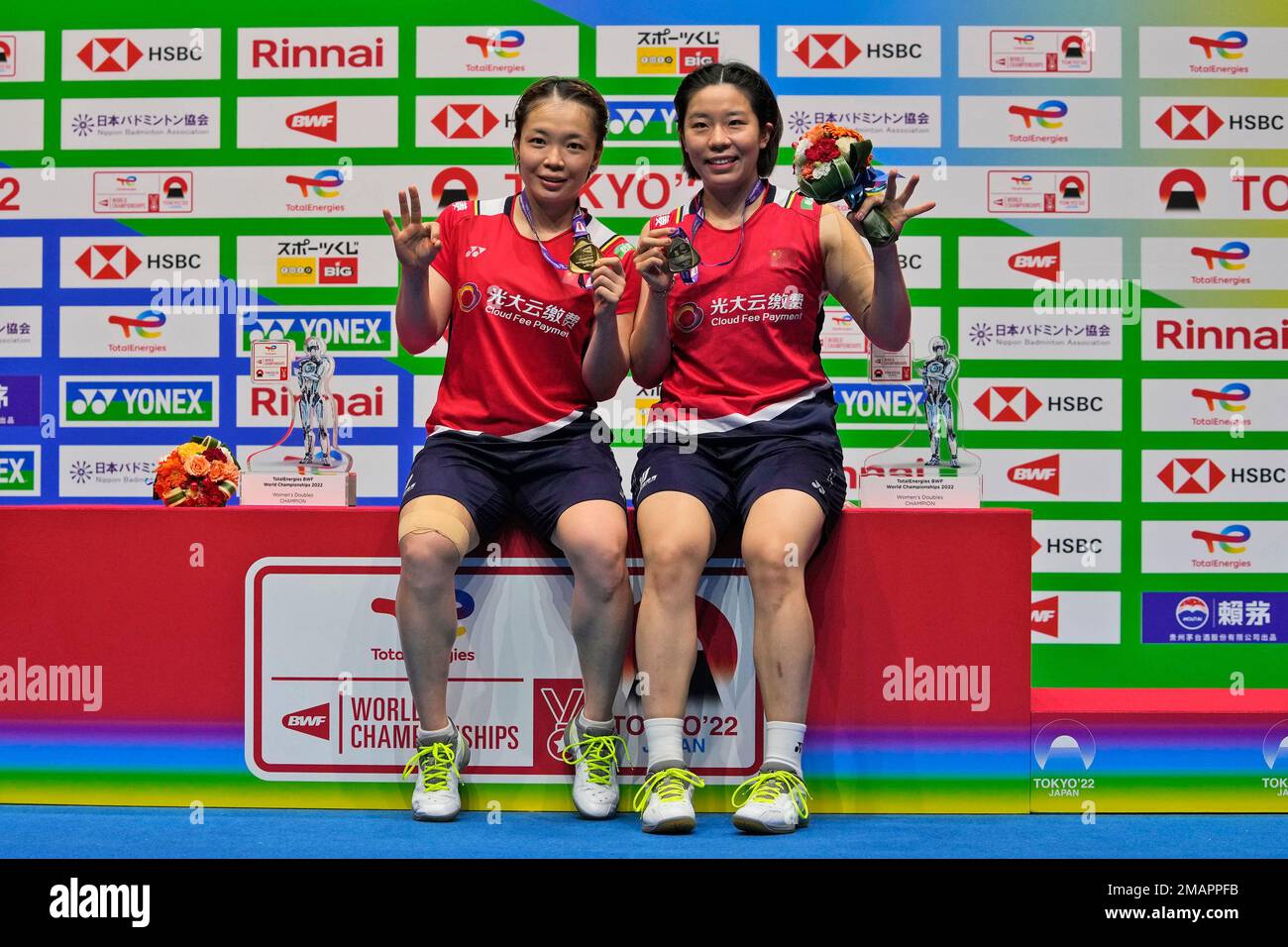 Chen Qing Chen, left, and Jia Yi Fan of China celebrate with their gold medals after defeating ...