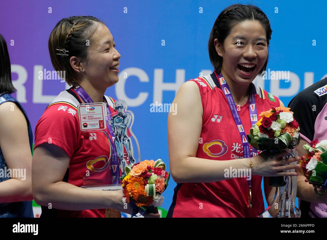 Chen Qing Chen, left, and Jia Yi Fan of China celebrate on the podium after defeating South ...