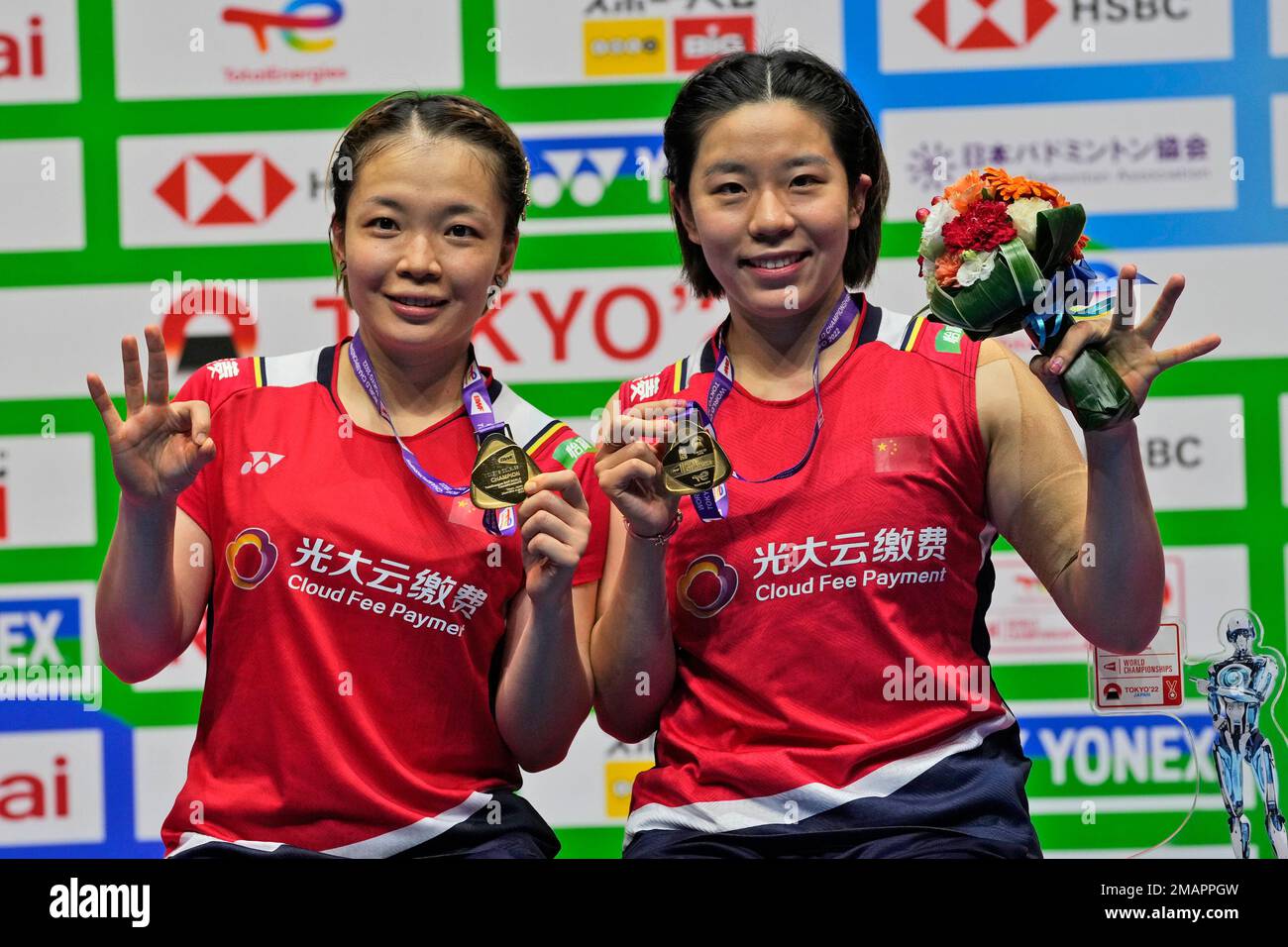Chen Qing Chen, left, and Jia Yi Fan of China celebrate eir gold medals after defeating South ...