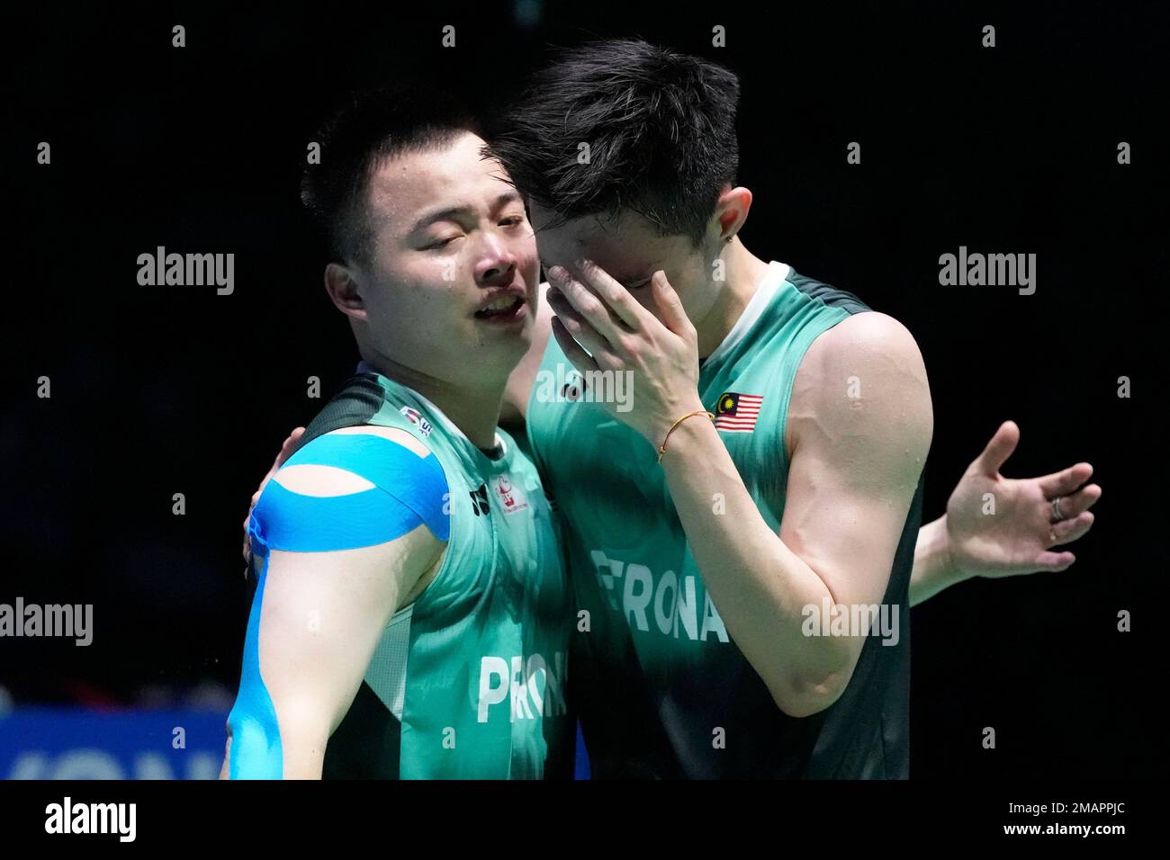 celebrate after defeating Indonesia's Mohammad Ahsan and Hendra ...
