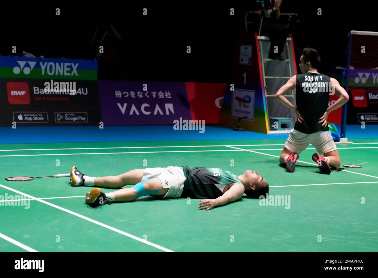 Malaysia's Aaron Chia, left, and Soh Wooi Yik celebrate after defeating ...