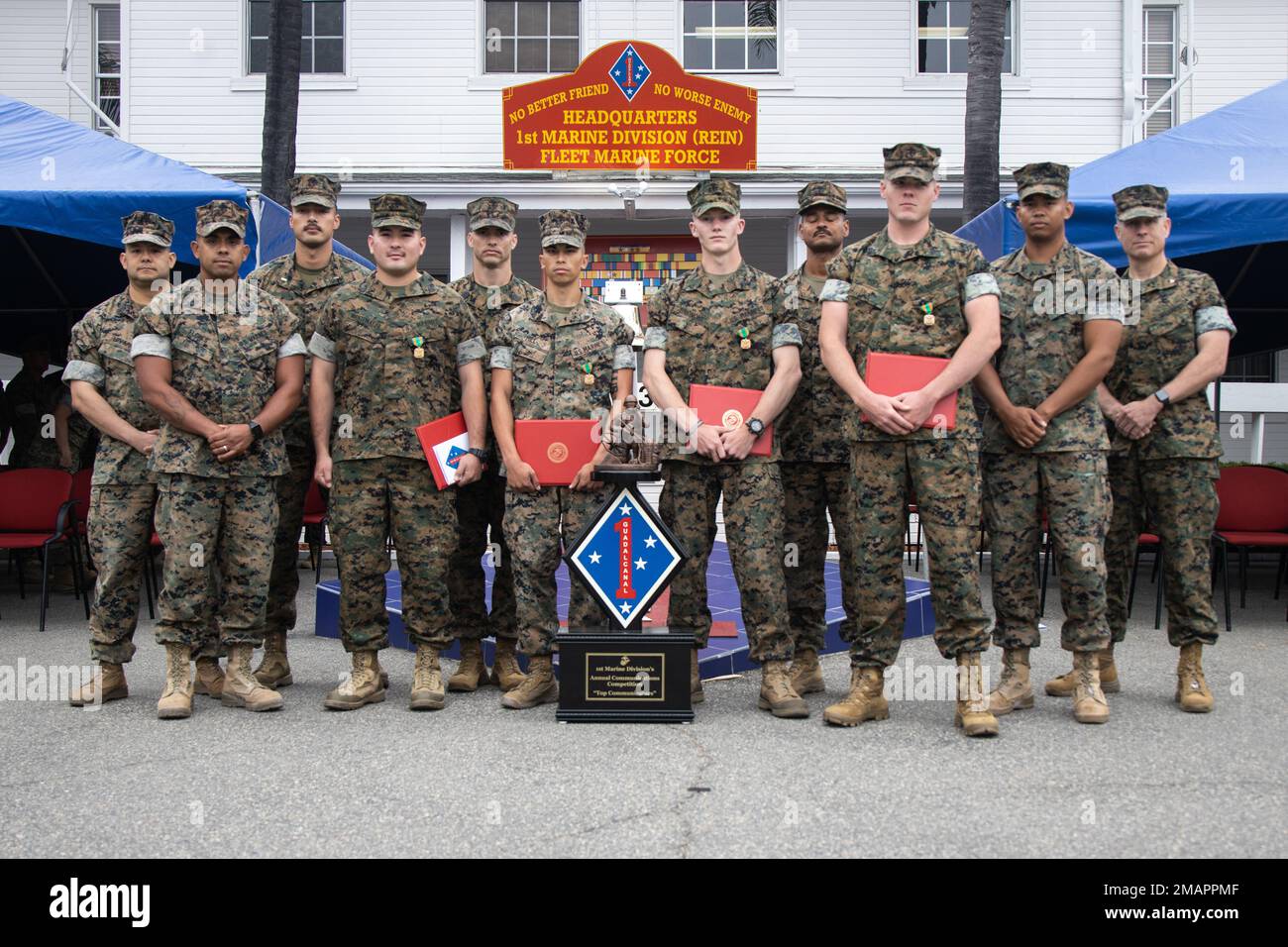 U.S. Marines with 1st Marine Division (1st MARDIV) pose for a group ...