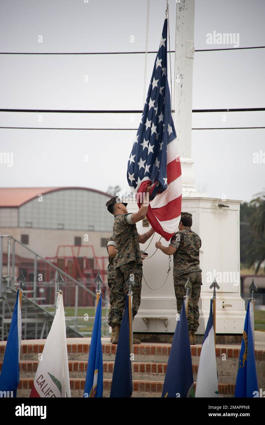 U.S. Marines with 1st Marine Division (1st MARDIV), raise the flag ...
