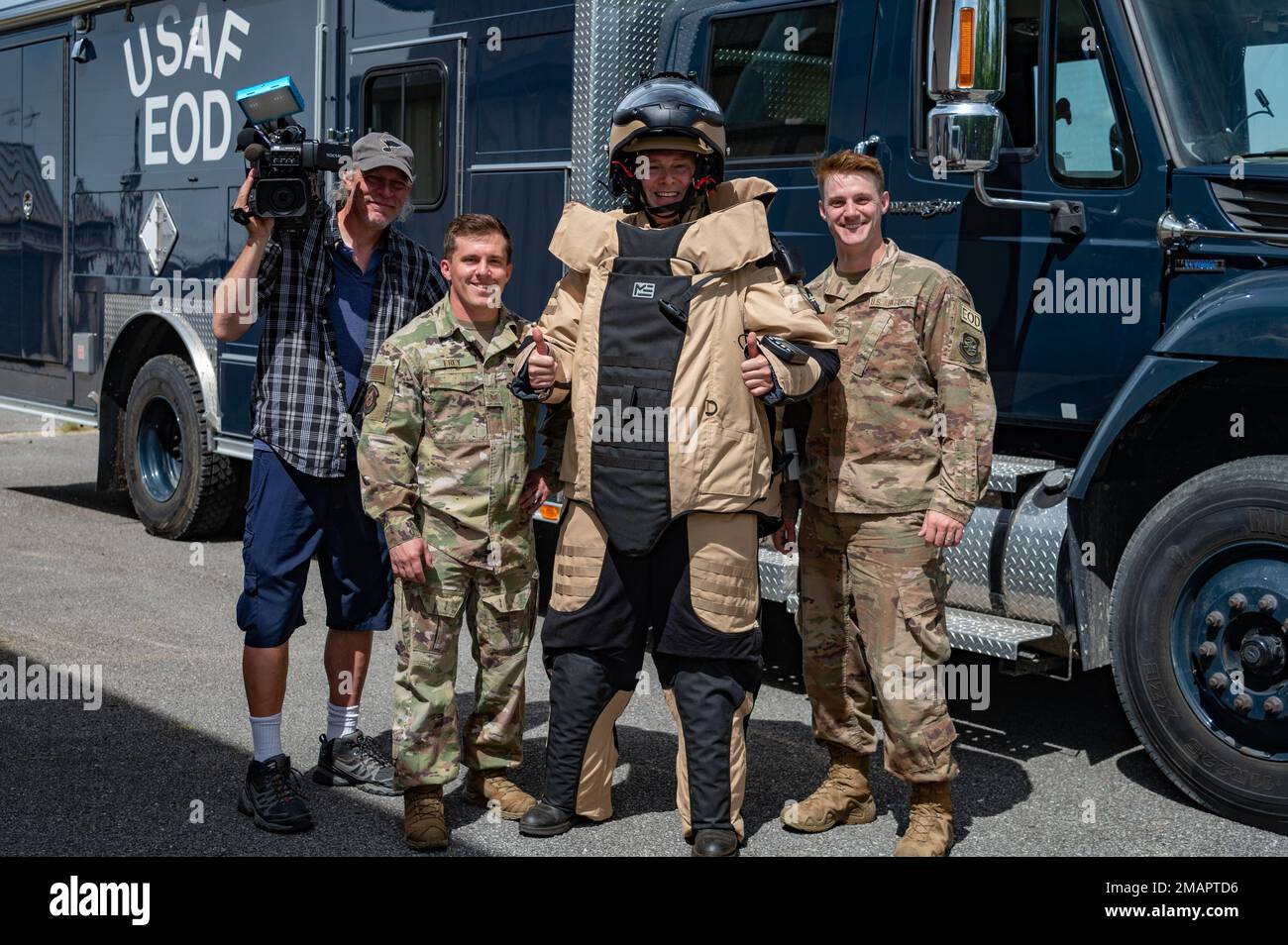 Fox news reporter and cameraman pose with Explosive Ordnance Disposal ...