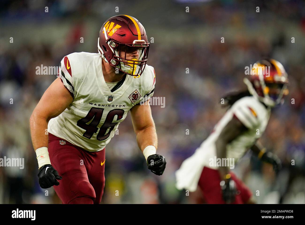 Washington Commanders tight end Jake Hausmann runs on the field in the ...