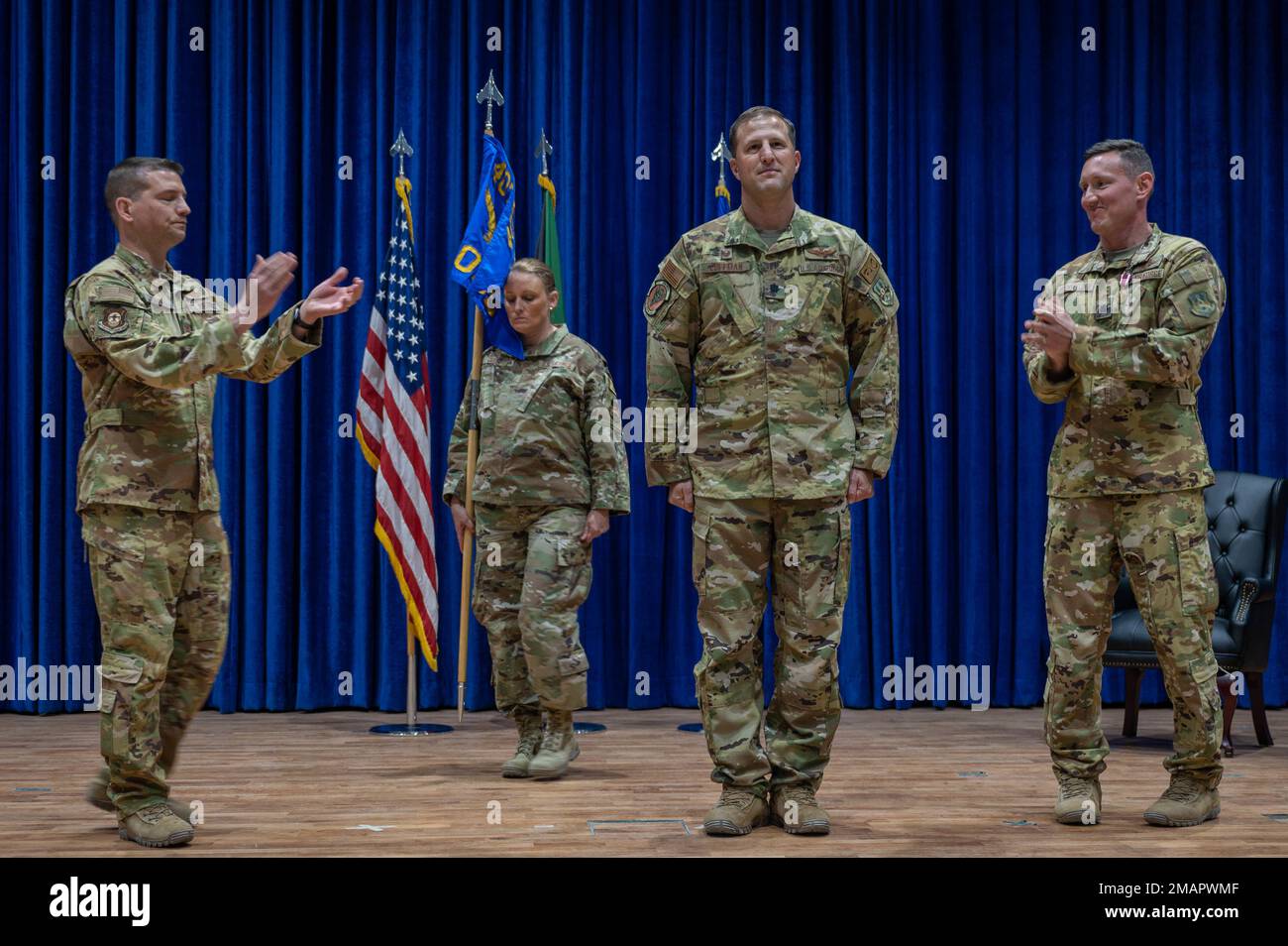 U.S. Air Force Lt. Col. Christopher Coffman, center, incoming commander ...