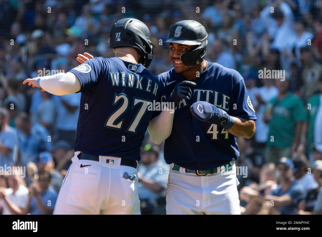 Seattle Mariners' Jesse Winker, left, and Julio Rodriguez celebrate ...