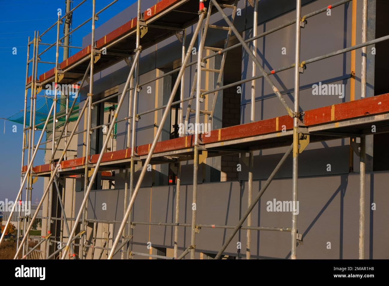 Scaffolding and construction. house in scaffolding .Foundation and ...