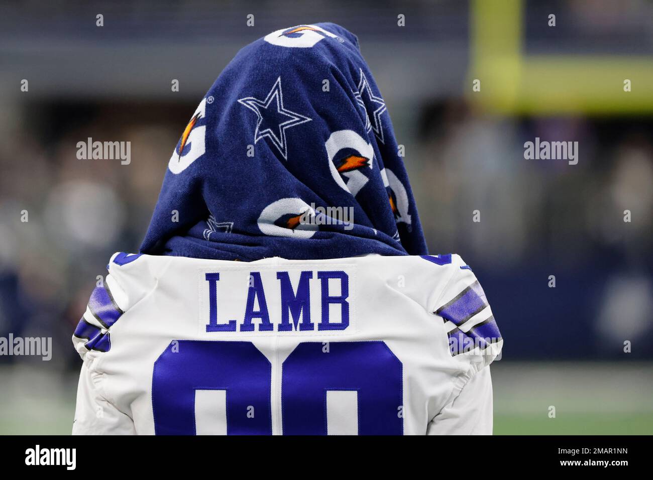 Dallas Cowboys wide receiver CeeDee Lamb looks on from the sidelines as ...