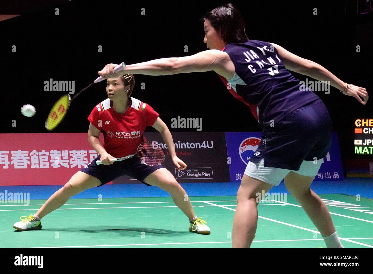 China's Chen Qing Chen, left, and Jia Yi Fan compete during a badminton game of the the women's ...