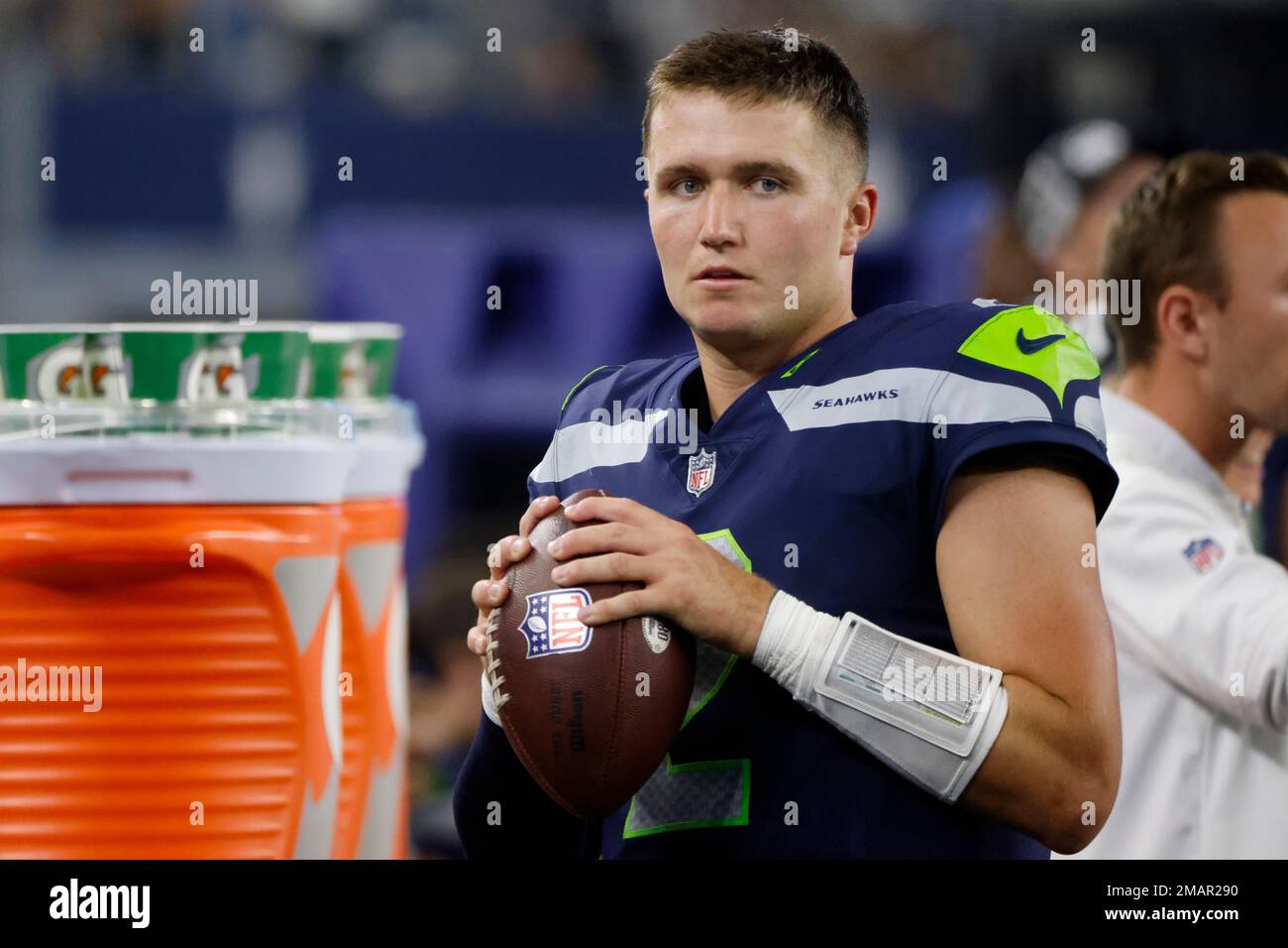 Seattle Seahawks quarterback Drew Lock holds the ball as he stands on ...