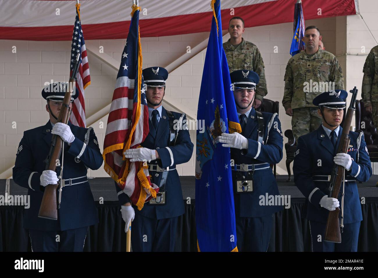 Dyess Honor Guard Members Present The Colors During The National Anthem