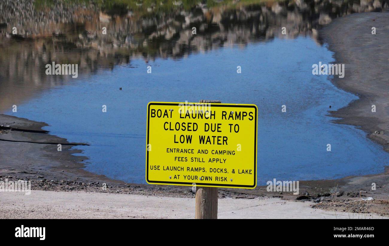 A "Boat Launch Ramps Closed Due To Low Water" sign is shown at the ...