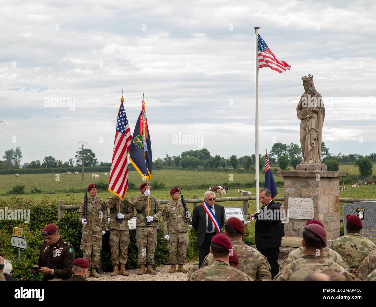 U.S. Army paratroopers hold the American flag during a ceremony June 3 ...