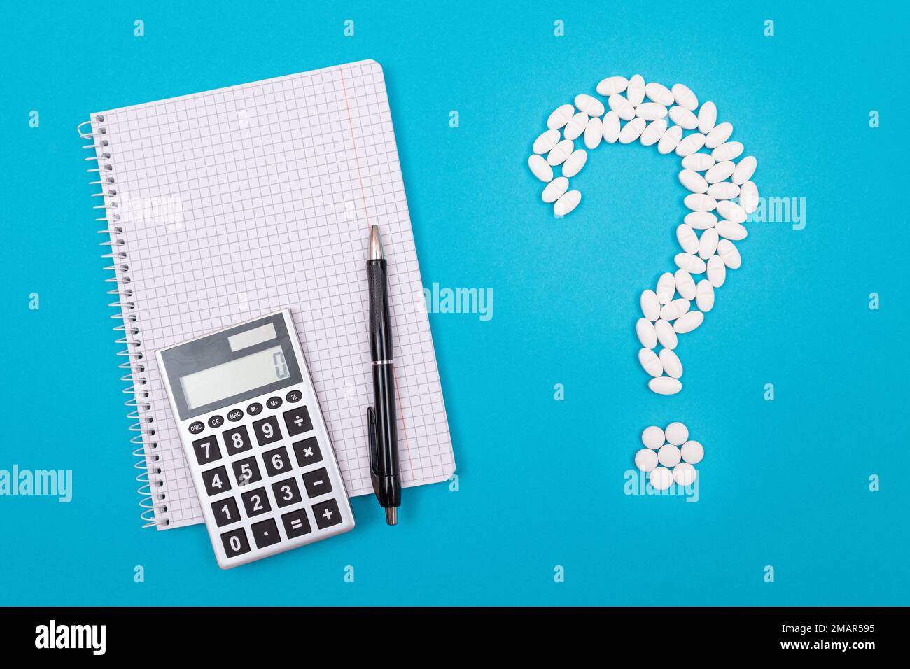 Treatment Costs and Budget. Question Mark Made from White Pills and ...