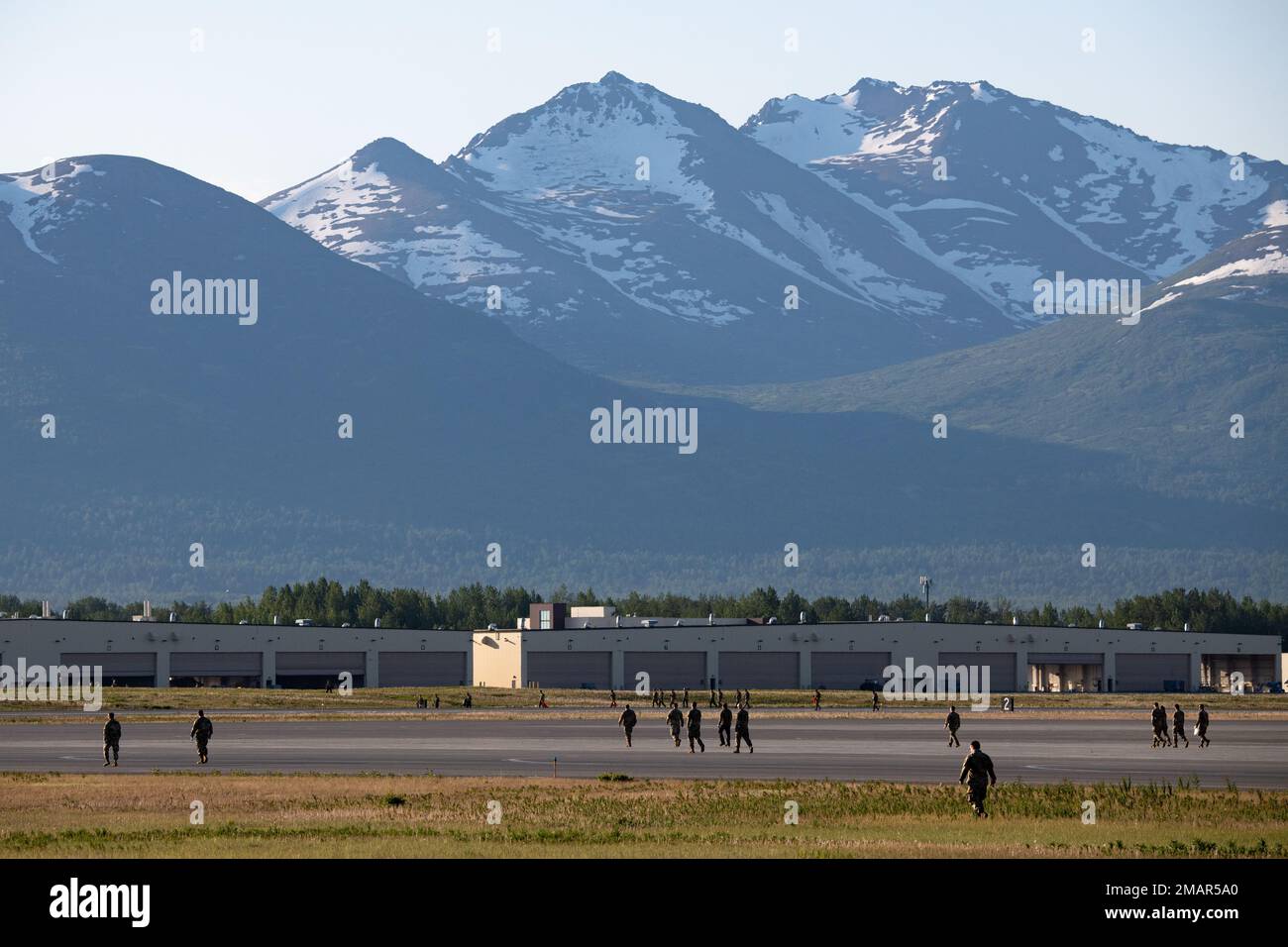 U.S. Airmen assigned to the 3rd Wing conduct a foreign object and ...