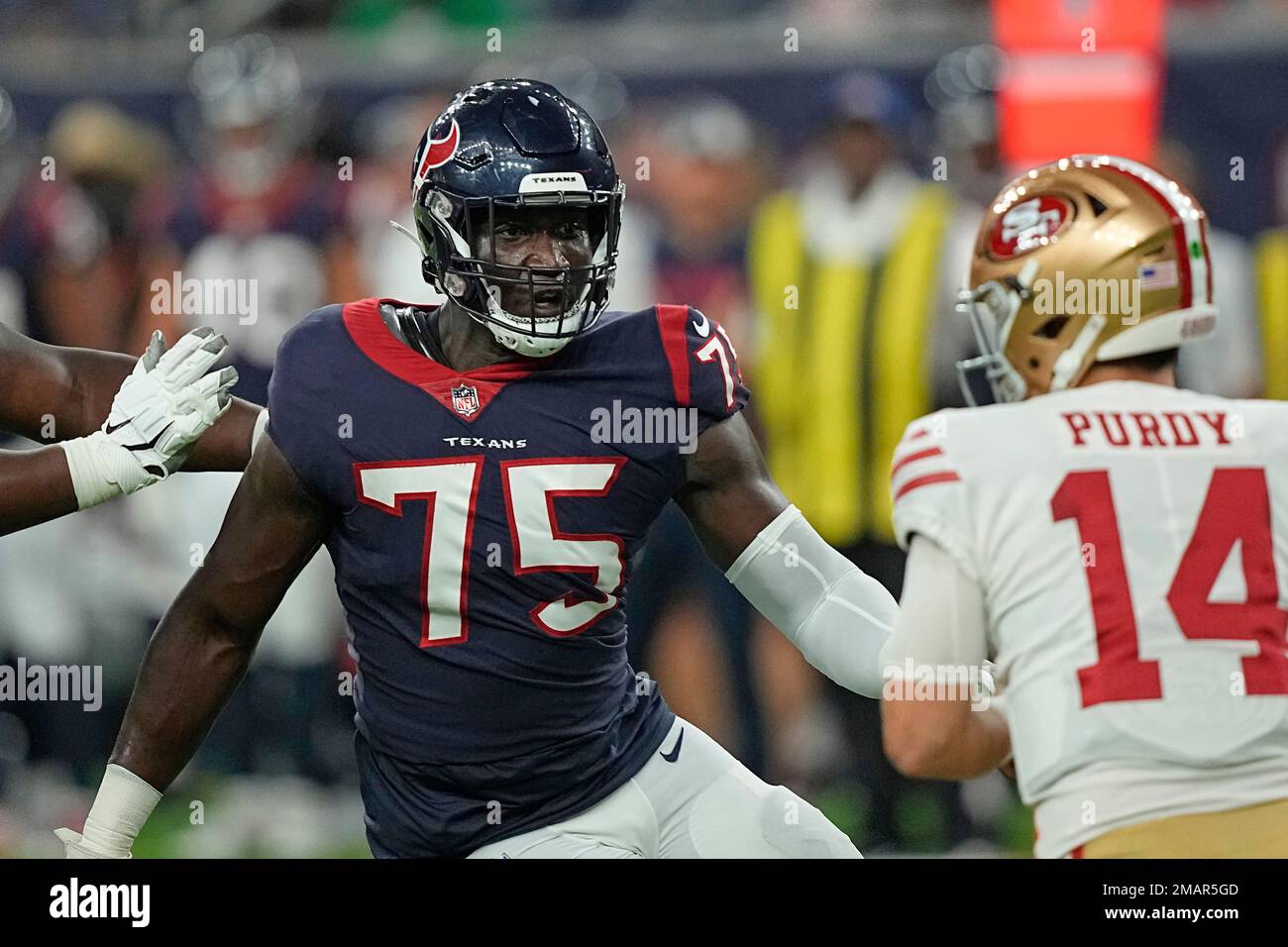 Houston Texans defensive end Adedayo Odeleye (75) rushes San Francisco 49ers quarterback Brock ...