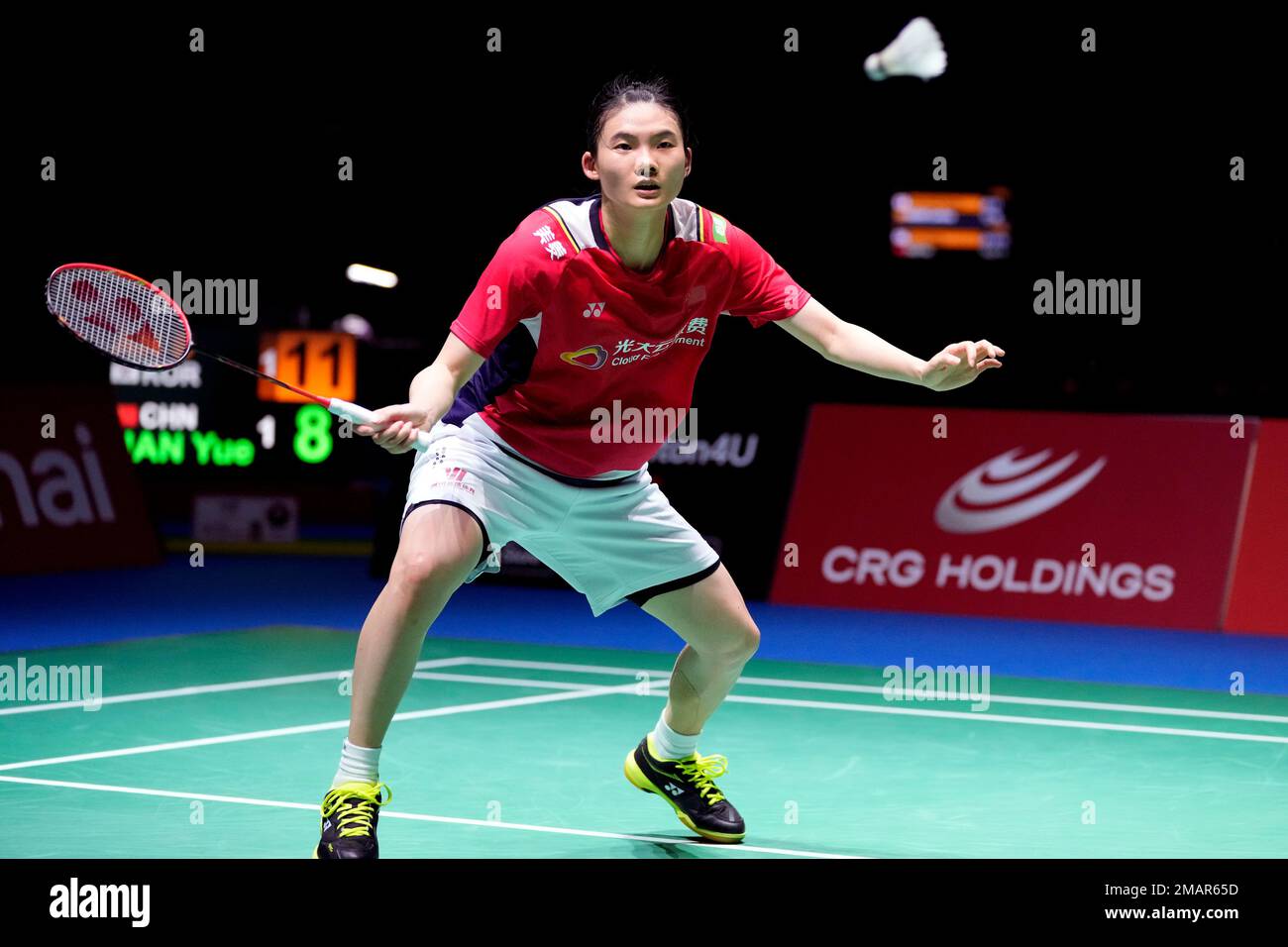 Han Yue of China plays a shot during her badminton game of the women's ...